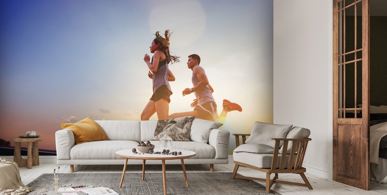 Young couples running sprinting on road. Fit runner fitness runner ...